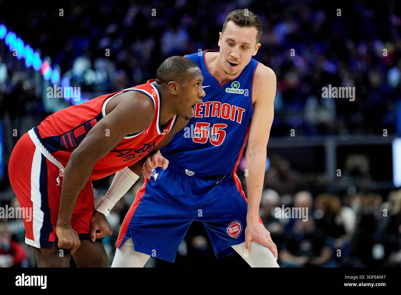 Detroit Pistons forward Duncan Robinson, right, speaks with LA Clippers ...