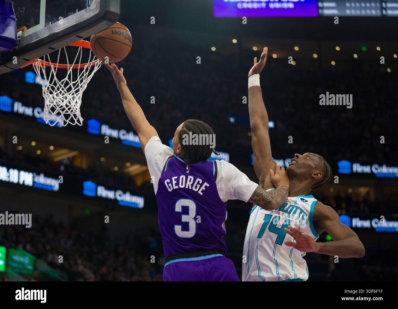 Utah Jazz guard Keyonte George (3) shoots a layup as he is defended by ...