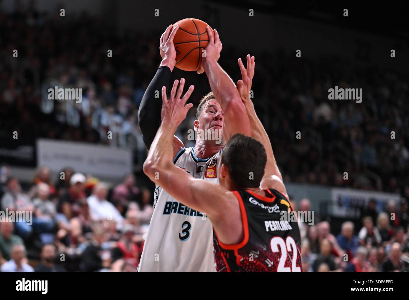 Sam Mennenga of the Breakers and Mason Peatling of the Hawks during the ...