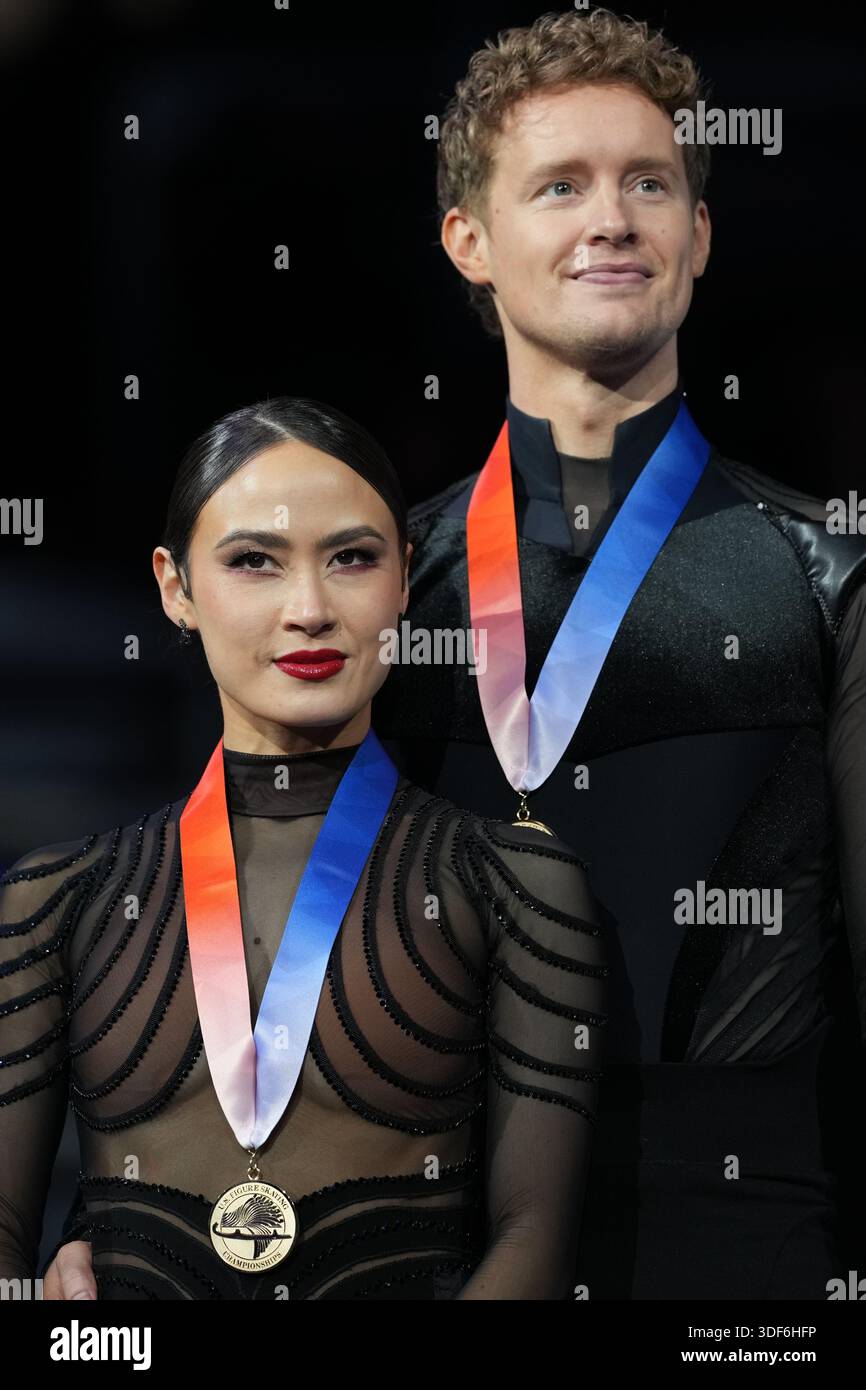 Gold medalists Madison Chock and Evan Bates pose with their medals ...
