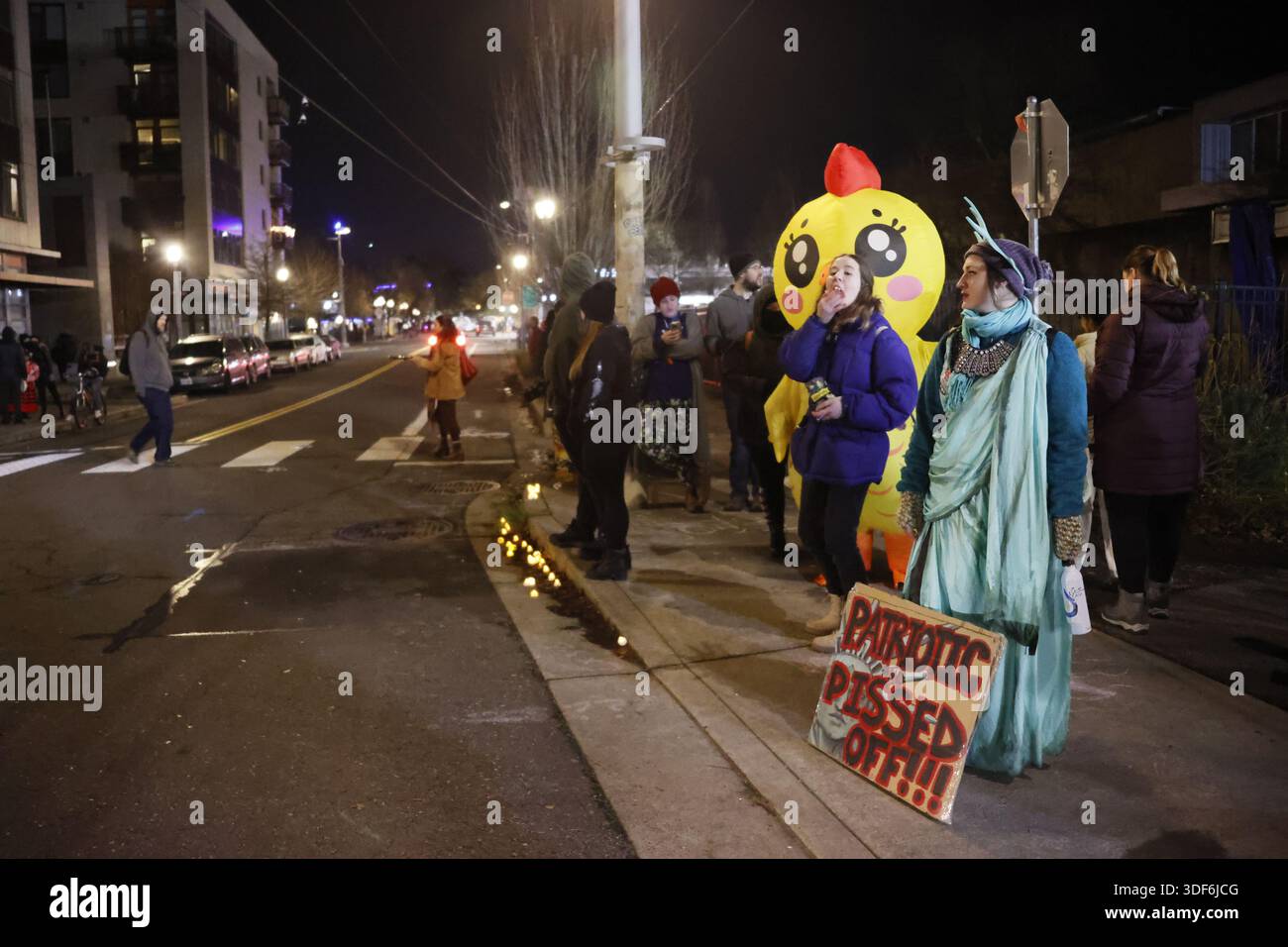 PORTLAND, OREGON – JANUARY 10: Protesters gather outside of the ICE ...