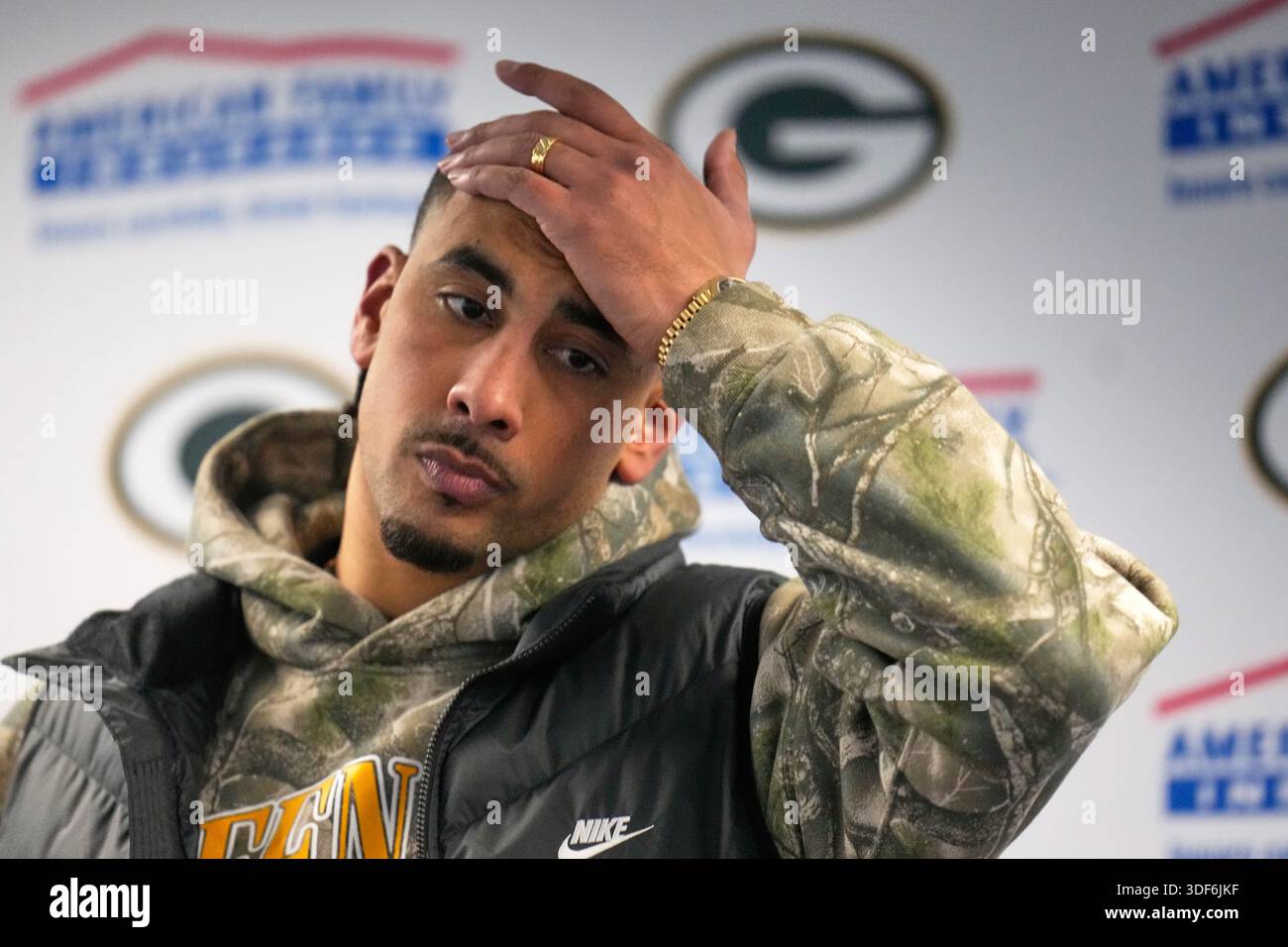 Green Bay Packers' Jordan Love talks after an NFL wild-card playoff ...