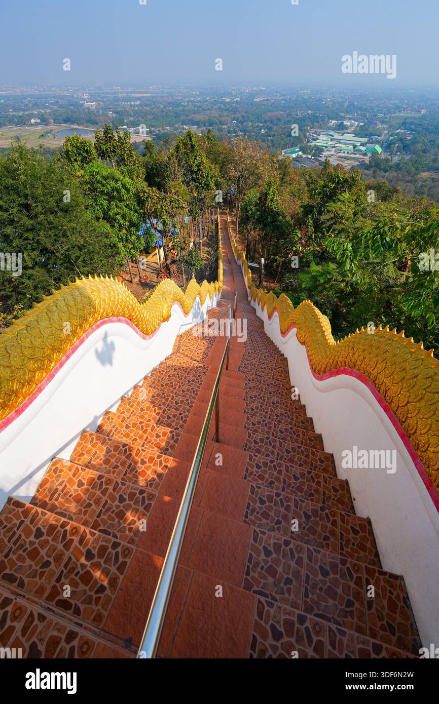 Traditional golden Naga staircase descending from Wat Phra That Doi ...