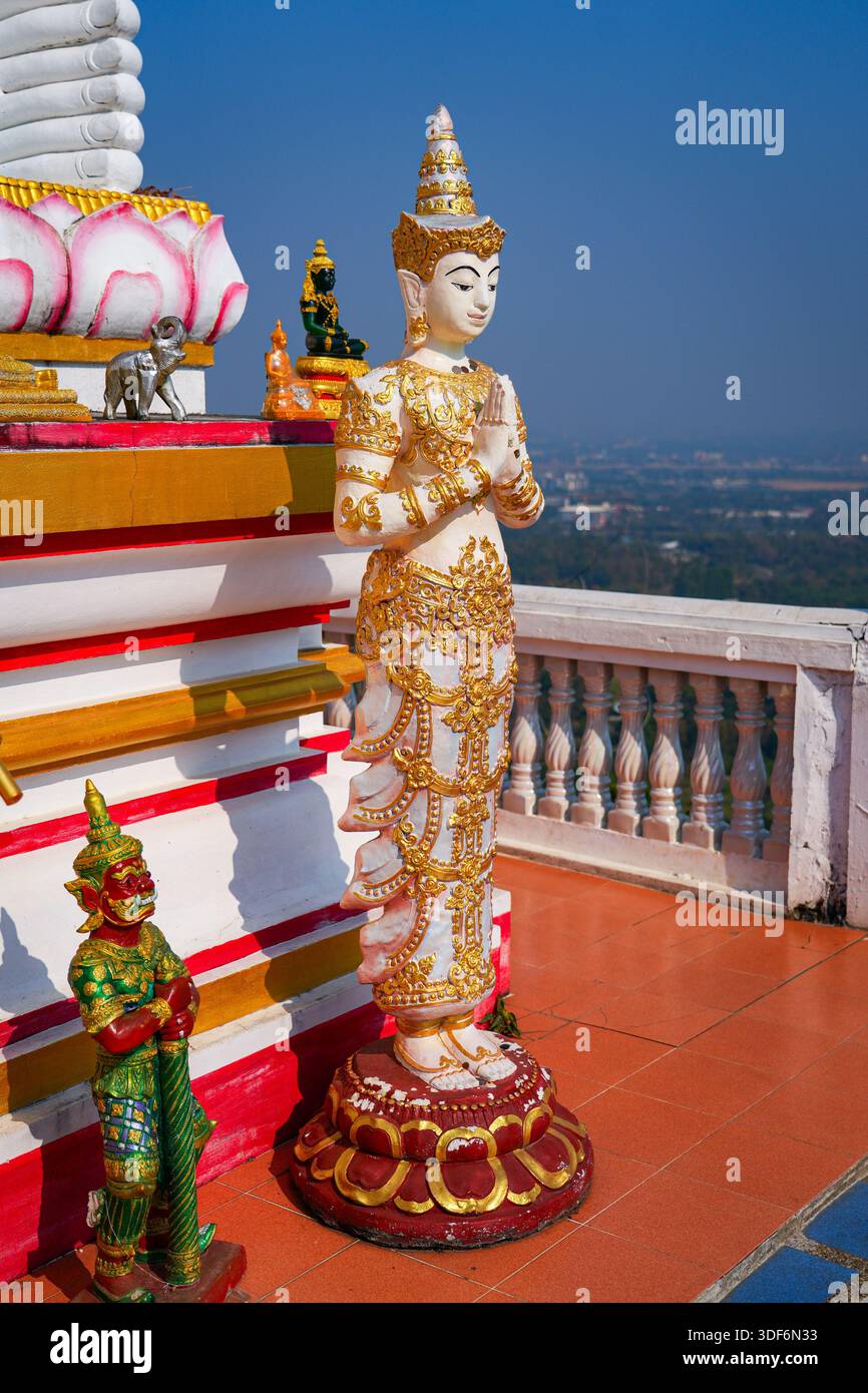 White and gold Thepanom angel statue at Wat Phra That Doi Kham temple ...