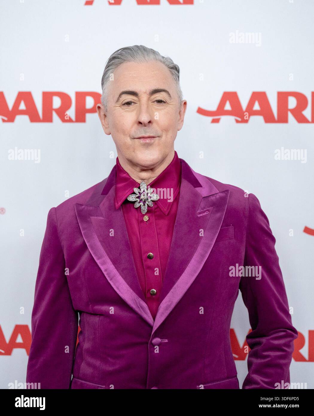 Alan Cummings arrives on the red carpet of the Movies for Grownups ...