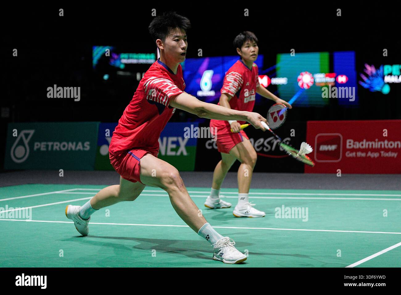 China's Feng Yan Zhe, front and Huang Dong Ping play against ...