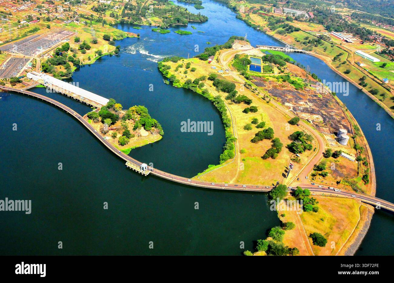 An aerial view of the Old Kiira Bridge and the Owen Falls Dam ...