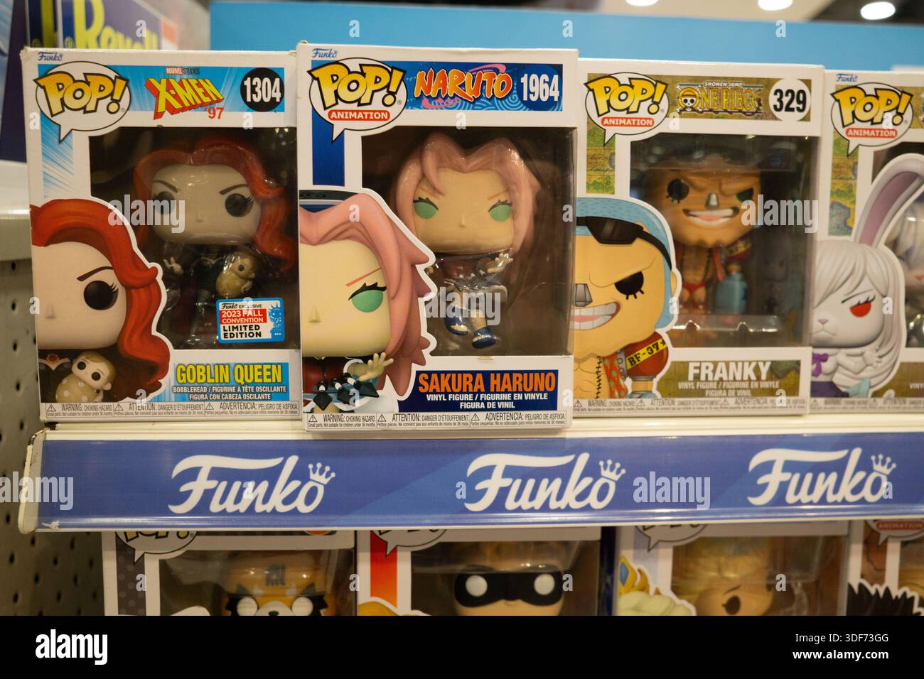 Funko Pop vinyl figures from Naruto, One Piece and X-Men displayed in a ...