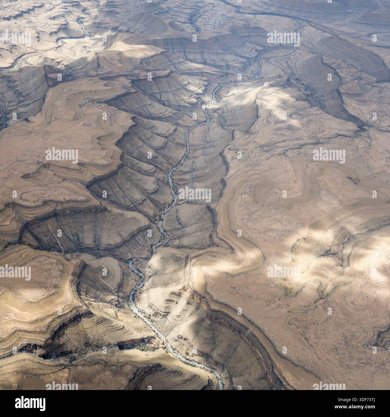 aerial landscape with dry riverbed at deep valley formed by weathering ...