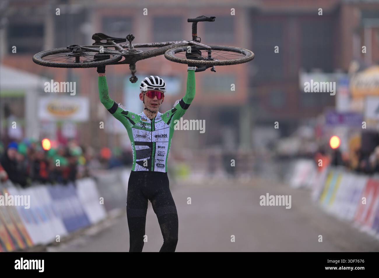 Belgian Mats Becque celebrates as he crosses the finish line to win the ...