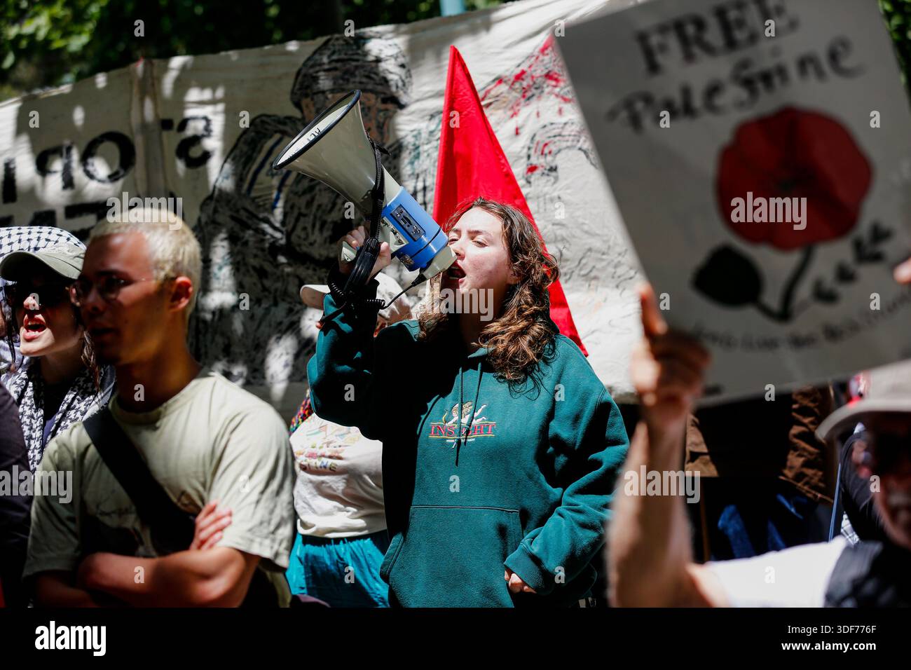 A protester shouts slogans during the rally. Pro-Palestinian supporters ...