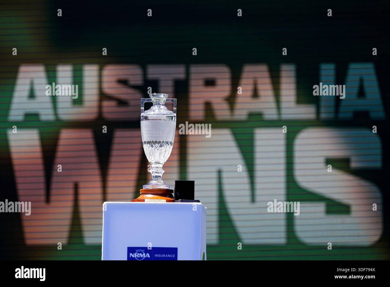 The Waterford Crystal Ashes Trophy stands on a plinth with a board ...
