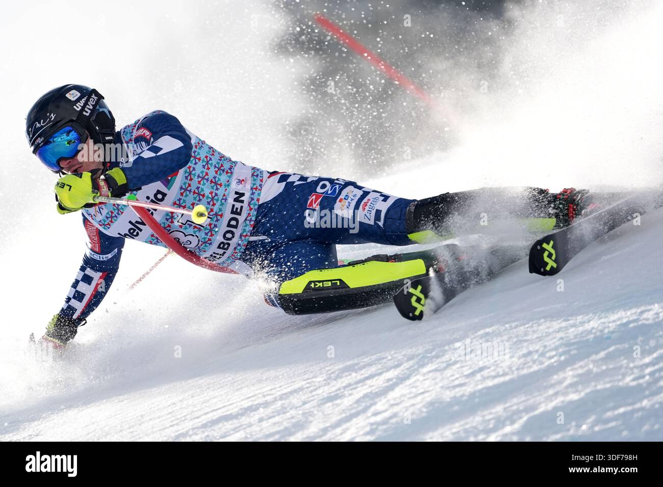Croatia's Istok Rodes falls as he speeds down the course during an ...