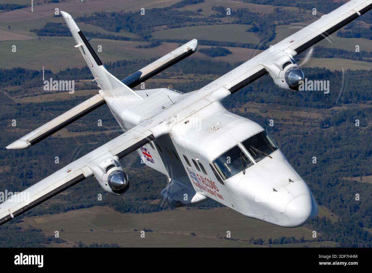 The image shows a Dornier 228-201 turboprop aircraft operated by Summit ...