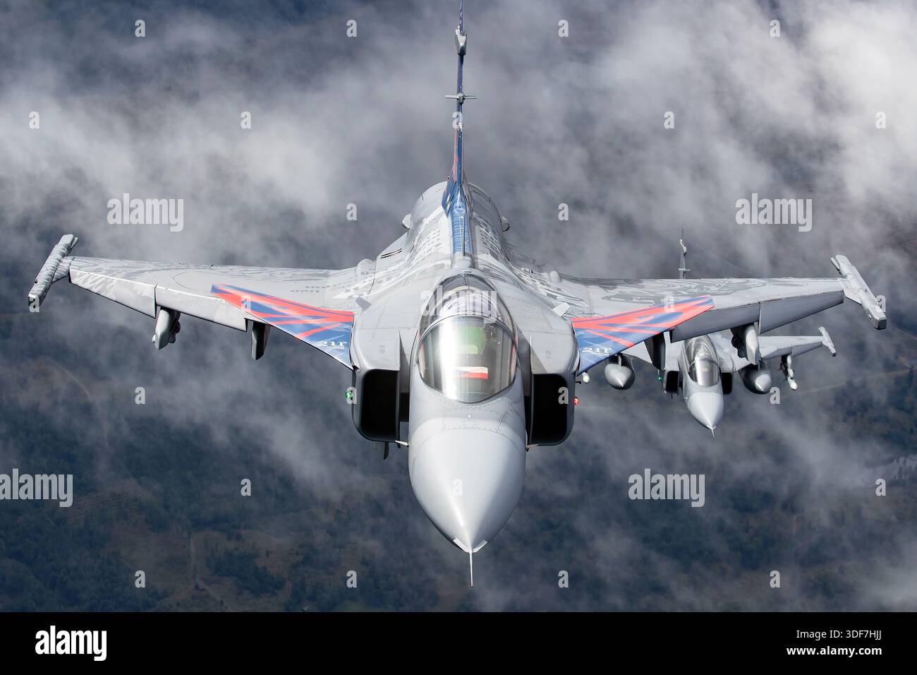 Two Saab JAS 39 Gripen fighters of the Czech Air Force maintain ...
