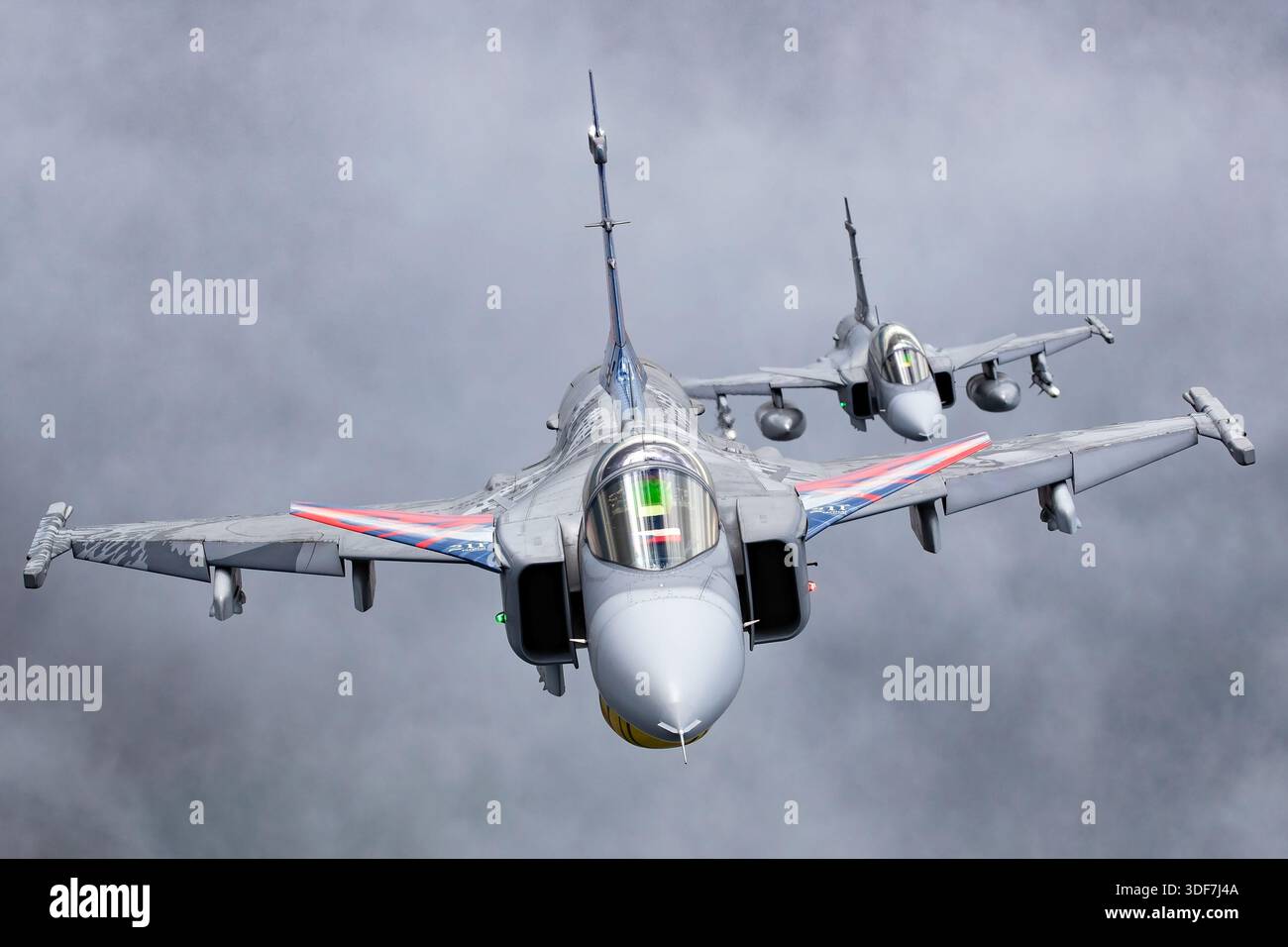 Two Czech Air Force Saab JAS 39 Gripen fighters, a single-seat JAS 39C ...