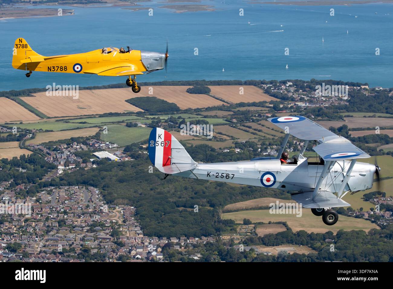 The image shows a formation flight of two British training aircraft at ...