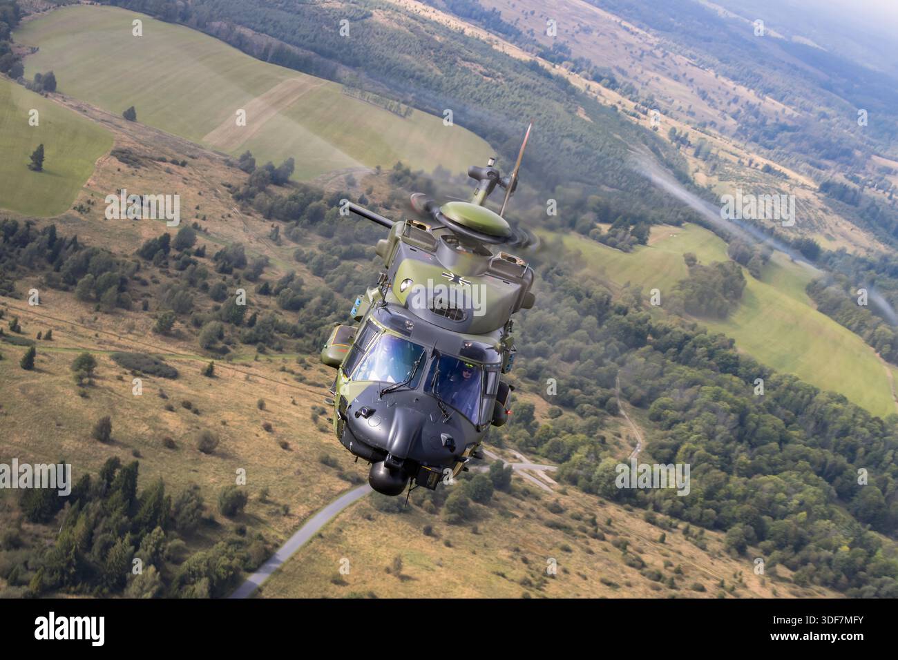 Air-to-air image of a German Army NHIndustries NH90 helicopter labeled ...