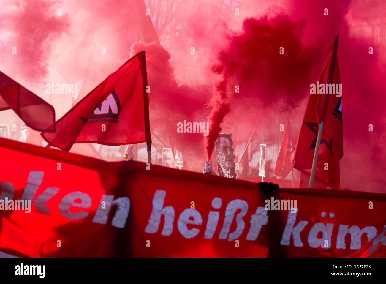 11 January 2026, Berlin: Participants set off pyrotechnics during the ...