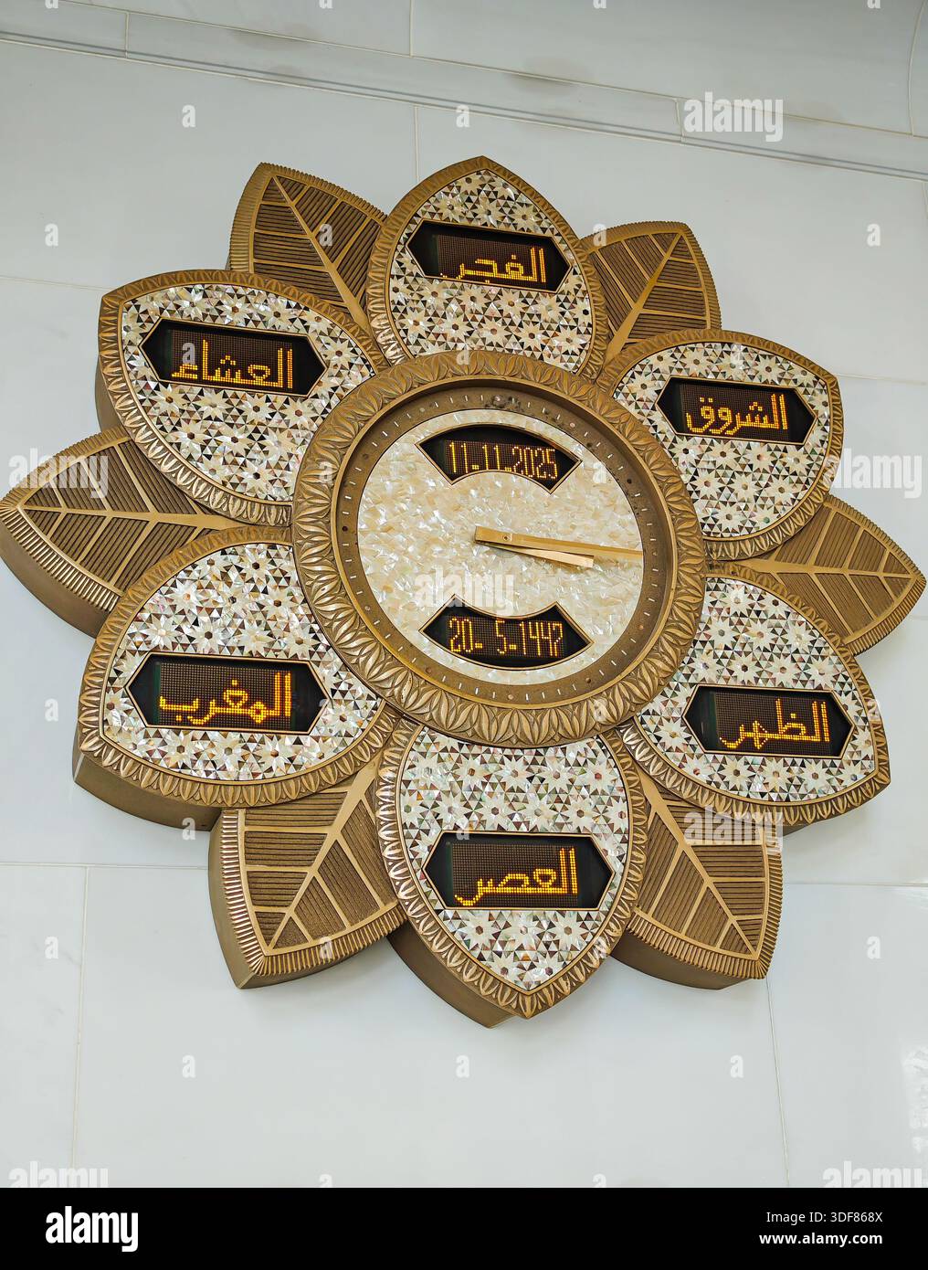 Islamic prayer clock. Arabic Muslim prayer clock and calendar, based on ...