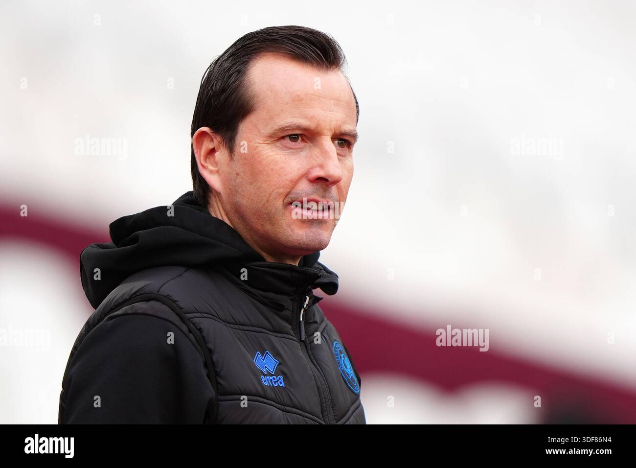 Queens Park Rangers manager Julien Stephan inspects the pitch before ...