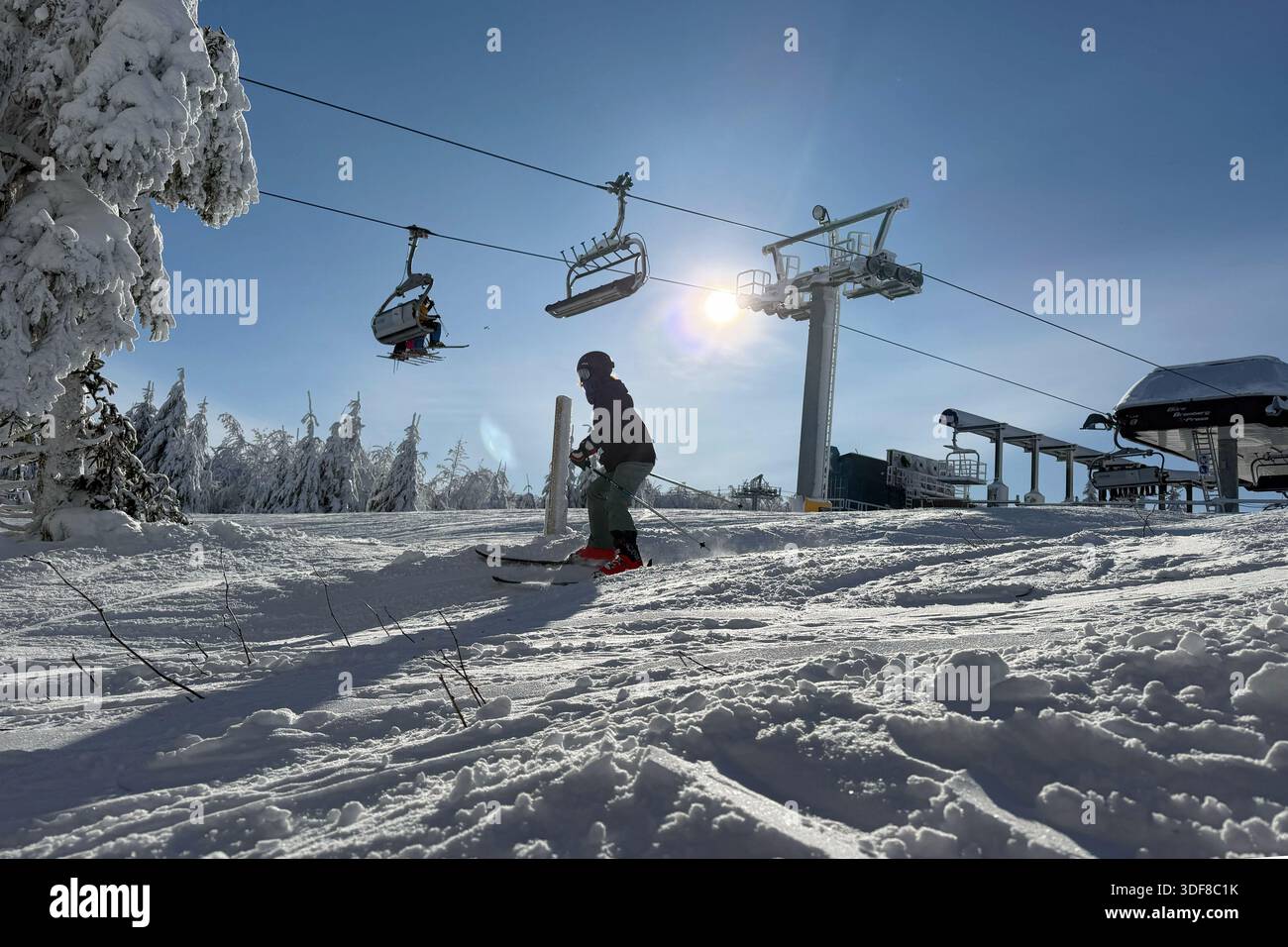 11 January 2026, North Rhine-Westphalia, Winterberg: A skier passes a ...