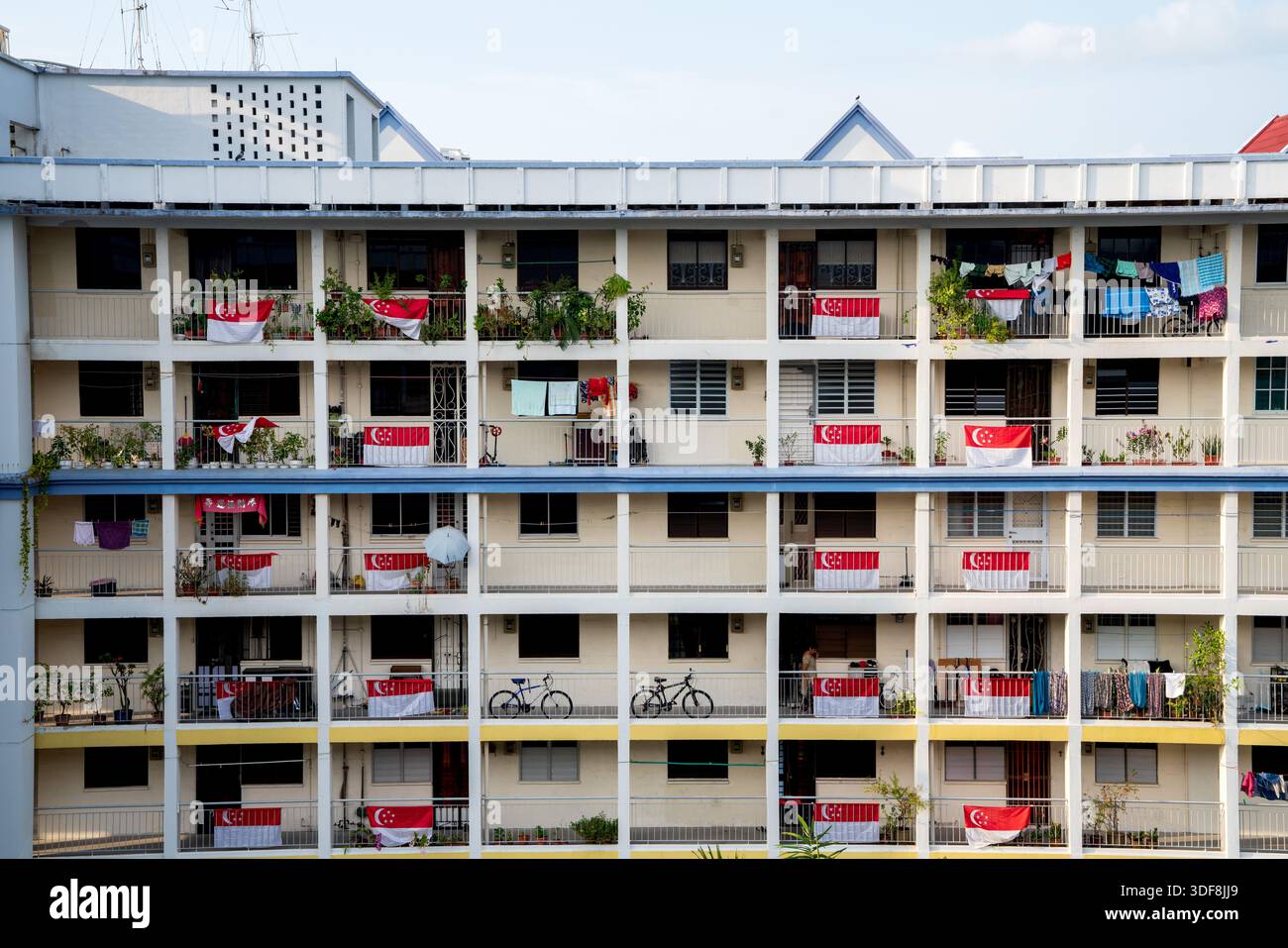 Singapore flags displayed on apartment balconies in celebration of ...