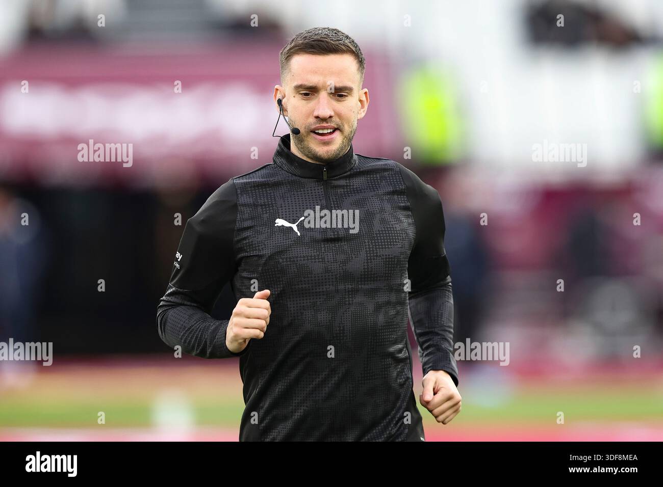 Referee Thomas Kirk warming up before the West Ham United v Queens Park ...
