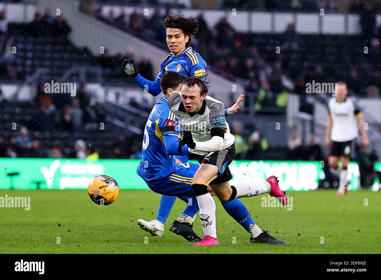 Sam Byram of Leeds United stops an attack by Owen Eames of Derby County ...