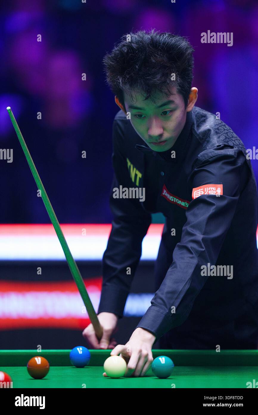 Wu Yize during the round one match between Shaun Murphy and Wu Yize at ...