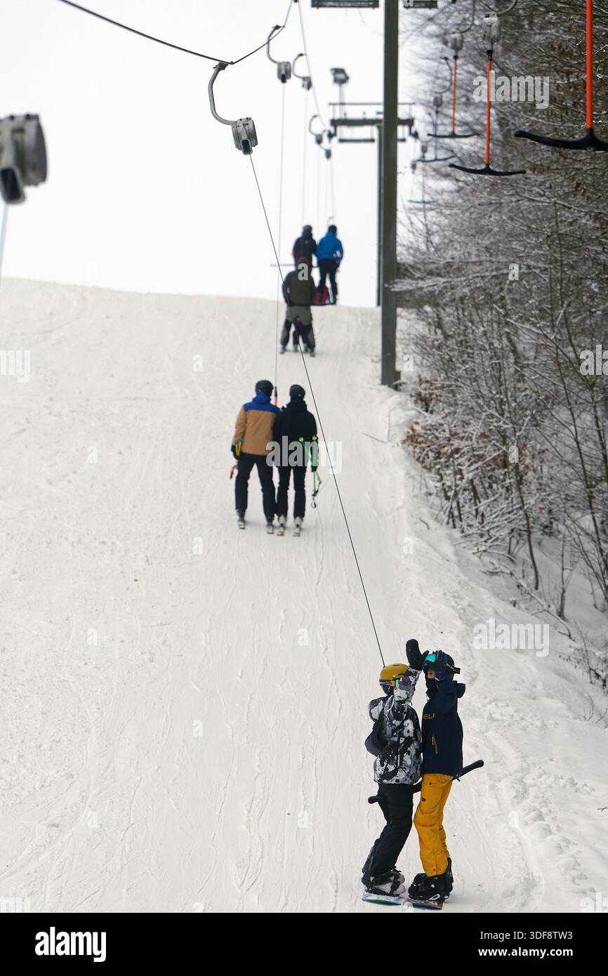 11 January 2026, Rhineland-Palatinate, Bad Marienberg: Skiers use a ski ...