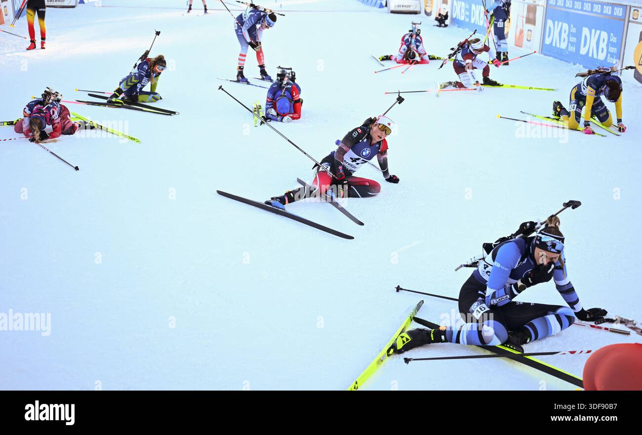 Athletes react at the finish line of the pursuit 10 km. women ...