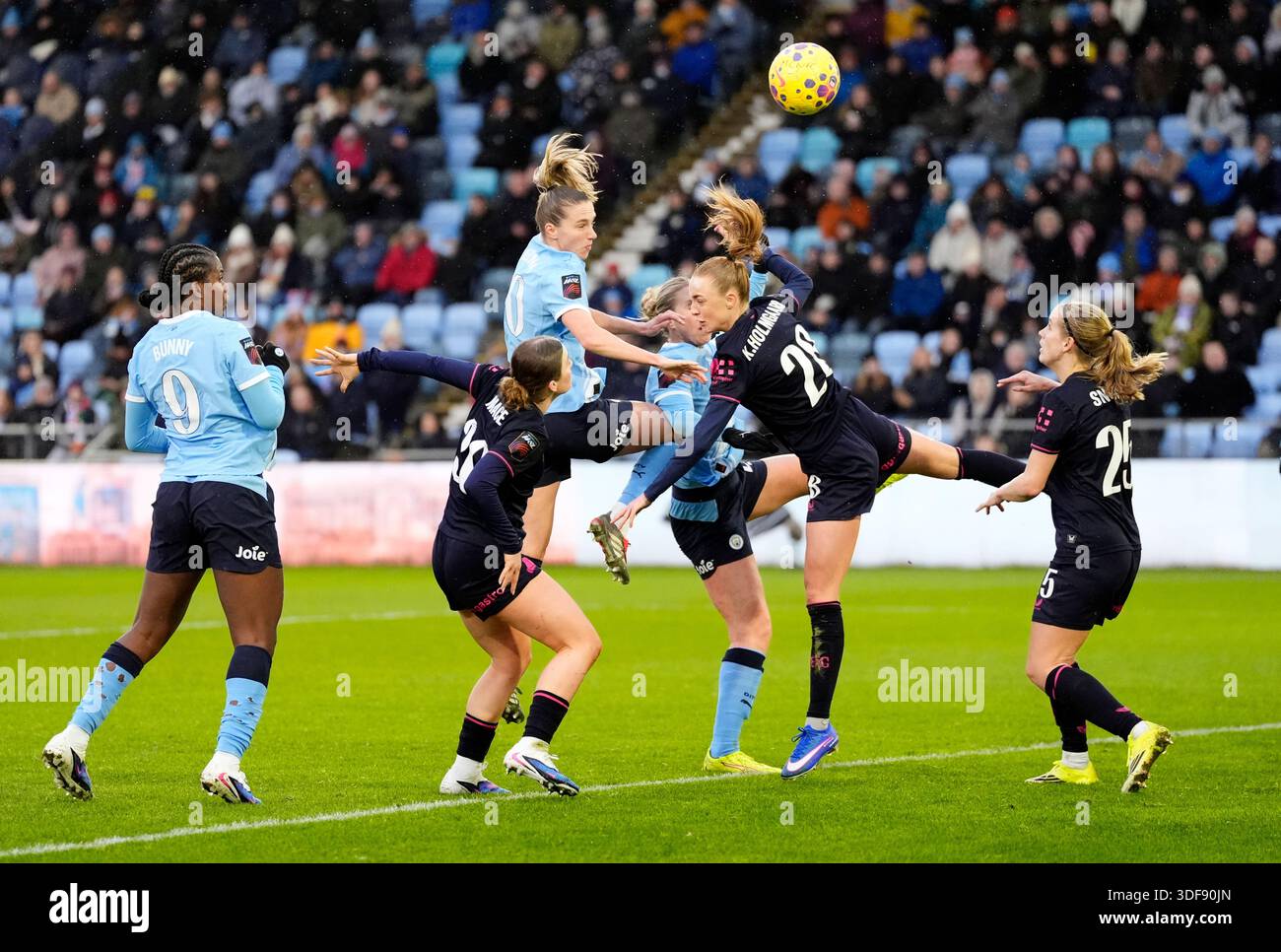 Manchester City's Vivianne Miedema (top) heads at goal during the ...