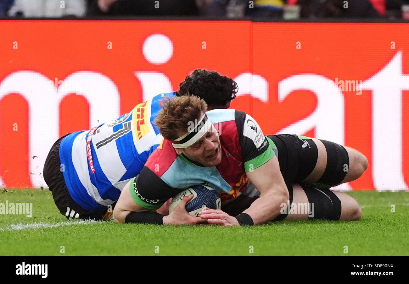Harlequins' Zach Carr (right) scores a try during the Investec Champions Cup match at Twickenham ...