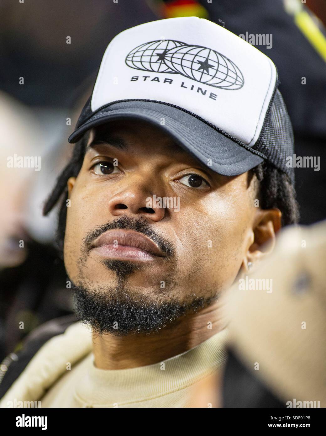 January 10, 2026: Chance the Rapper looks on from the sidelines during ...