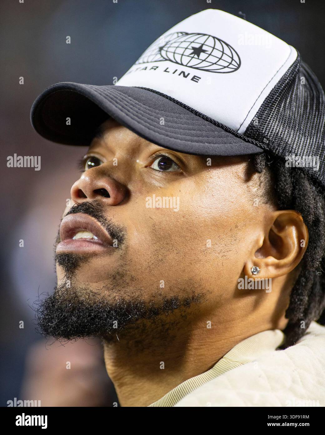 January 10, 2026: Chance the Rapper looks on from the sidelines during ...