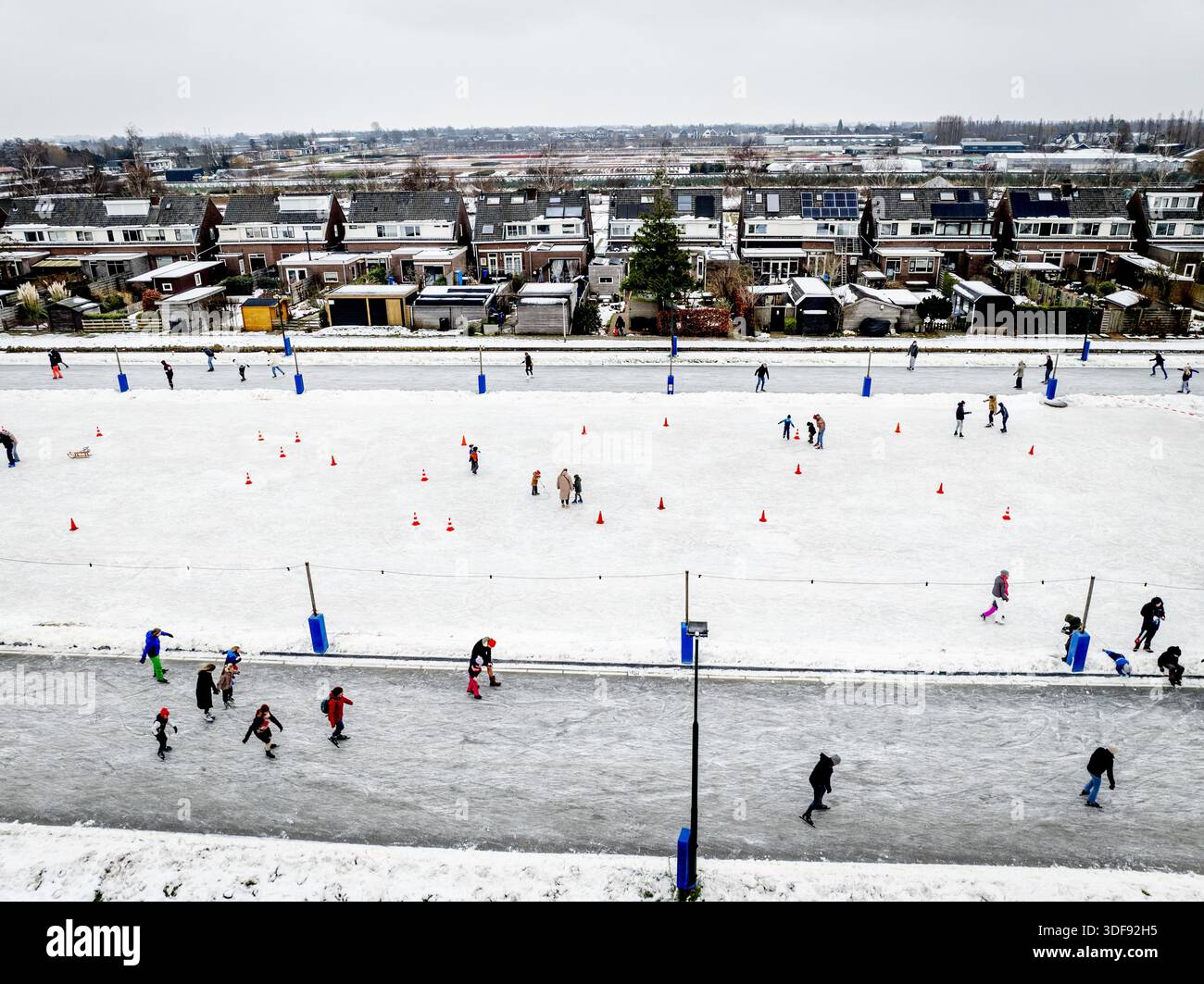 BOSKOOP - People are skating on the natural ice rink. Skating is ...