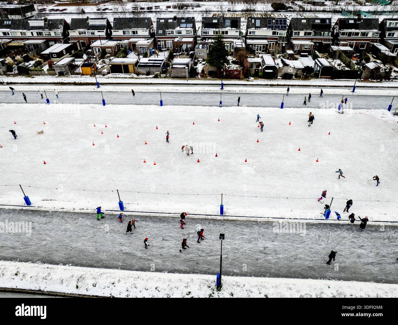 BOSKOOP - People are skating on the natural ice rink. Skating is ...