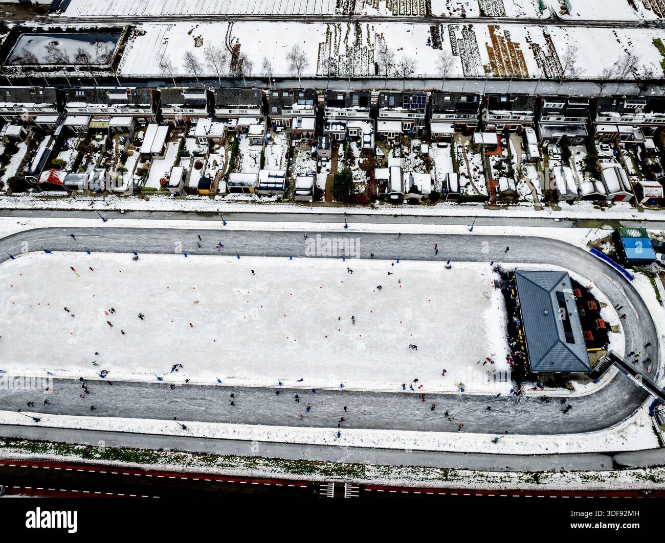 BOSKOOP - People are skating on the natural ice rink. Skating is ...