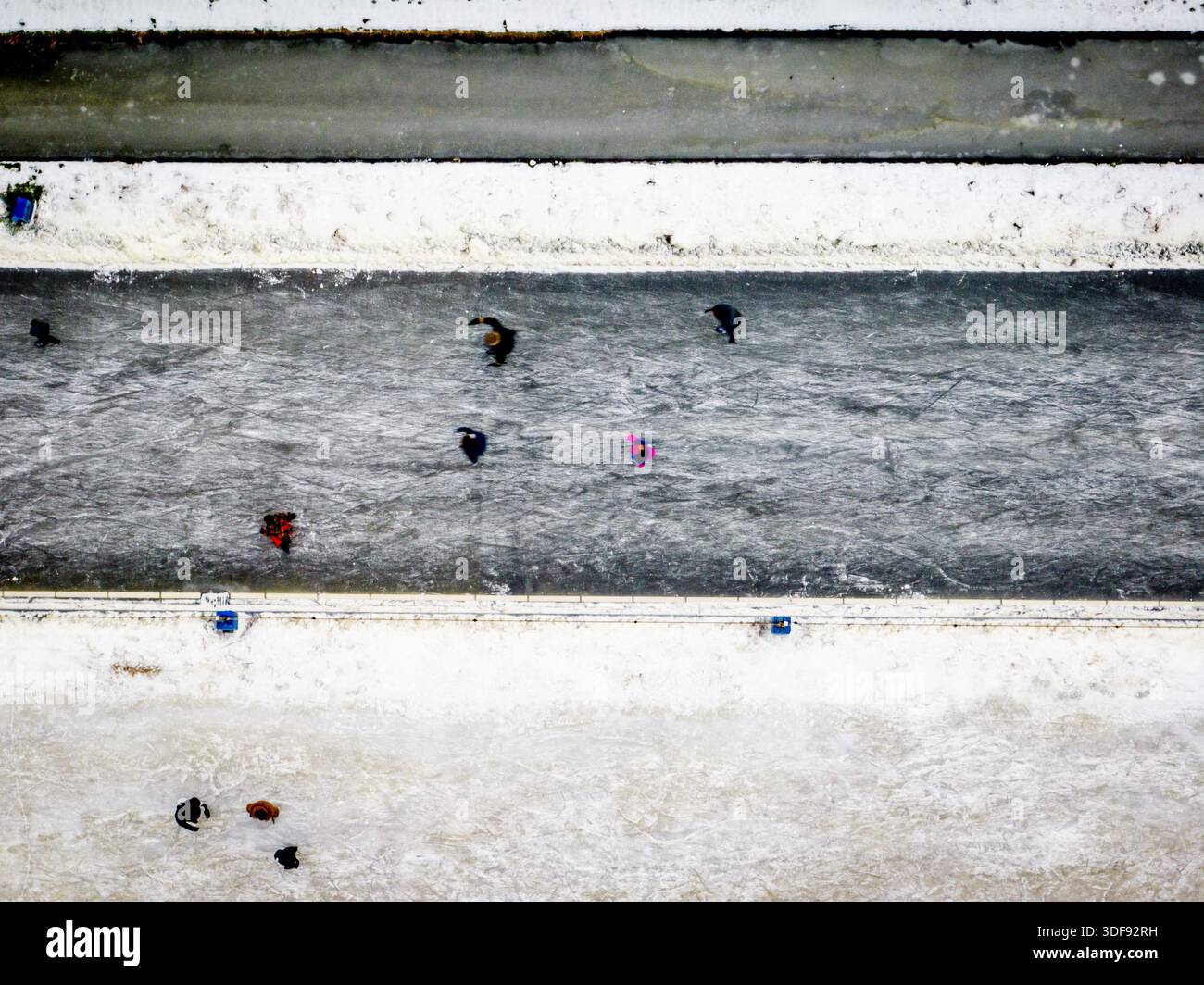 BOSKOOP - People are skating on the natural ice rink. Skating is ...
