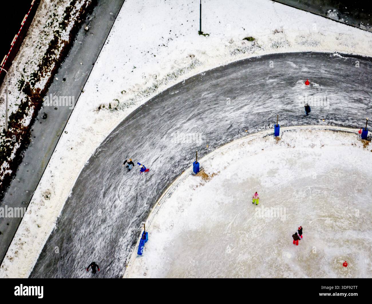 BOSKOOP - People are skating on the natural ice rink. Skating is ...