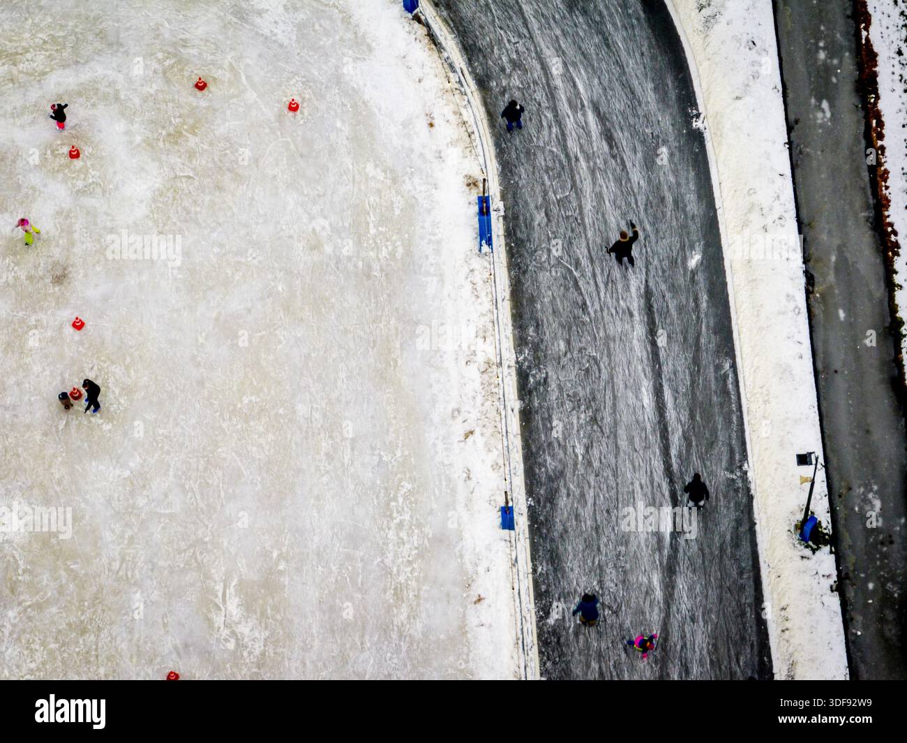BOSKOOP - People are skating on the natural ice rink. Skating is ...