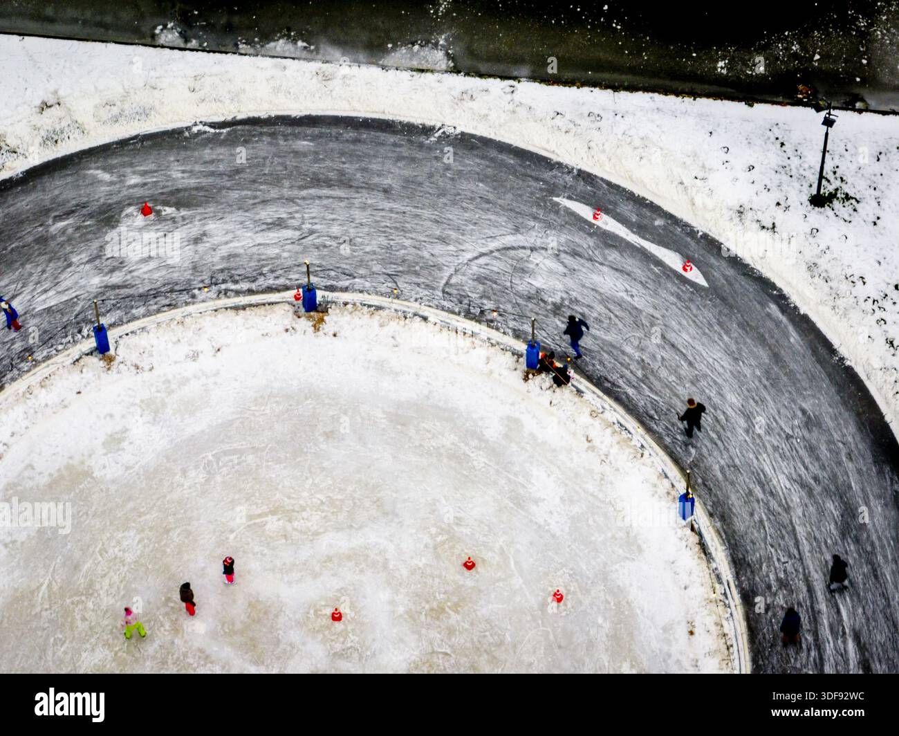 BOSKOOP - People are skating on the natural ice rink. Skating is ...