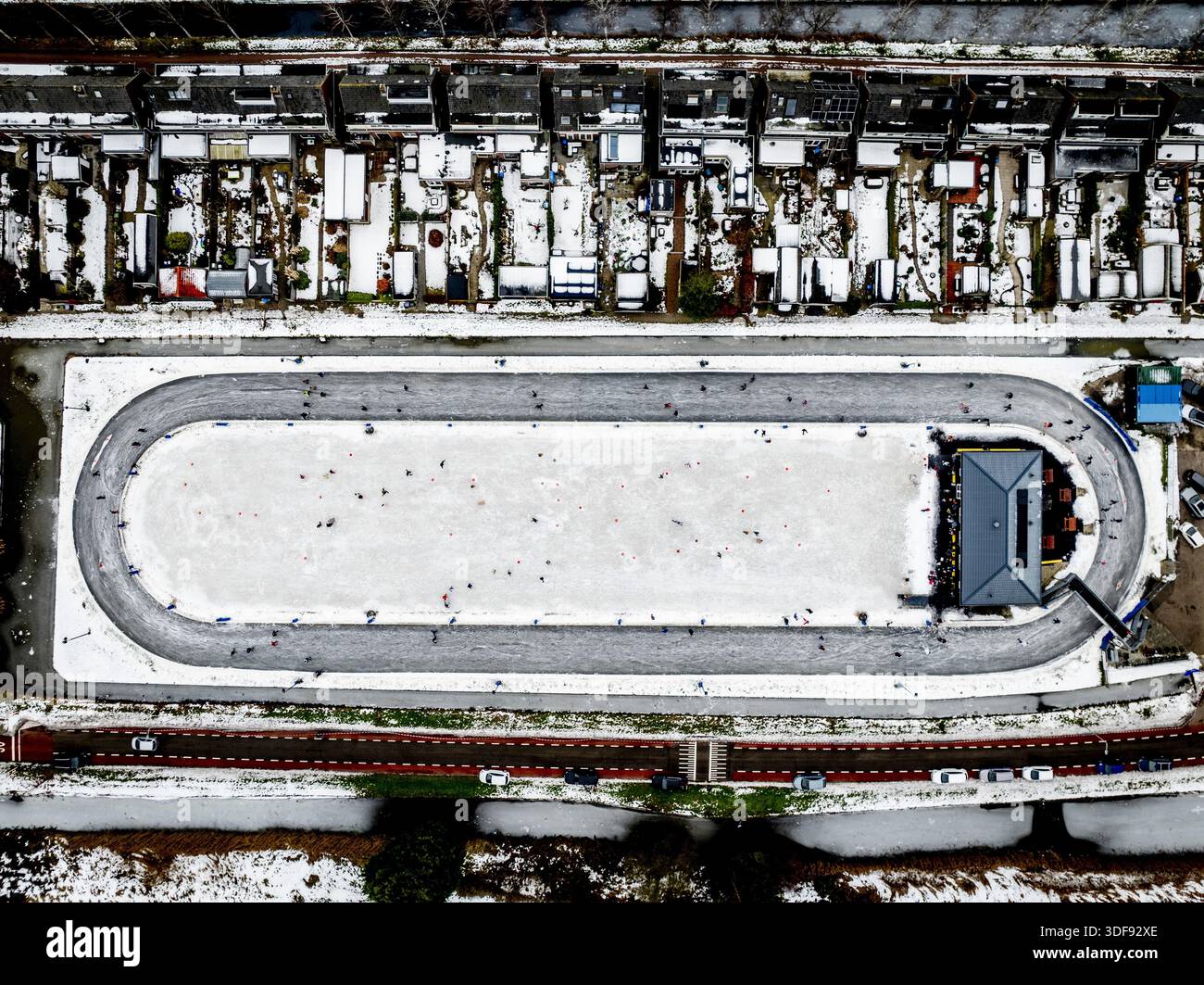 BOSKOOP - People are skating on the natural ice rink. Skating is ...