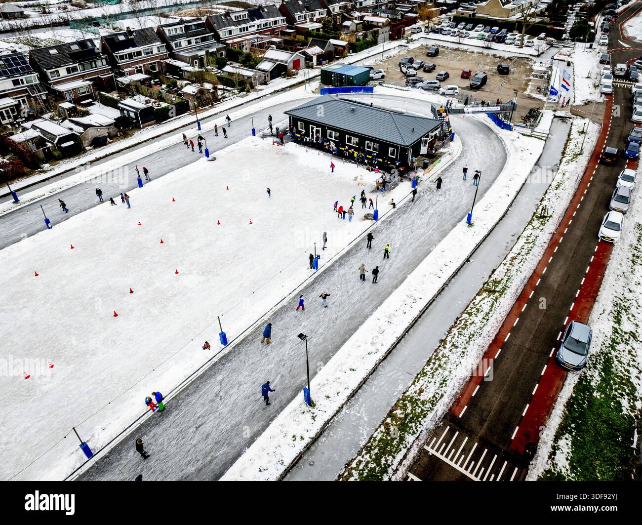 BOSKOOP - People are skating on the natural ice rink. Skating is ...