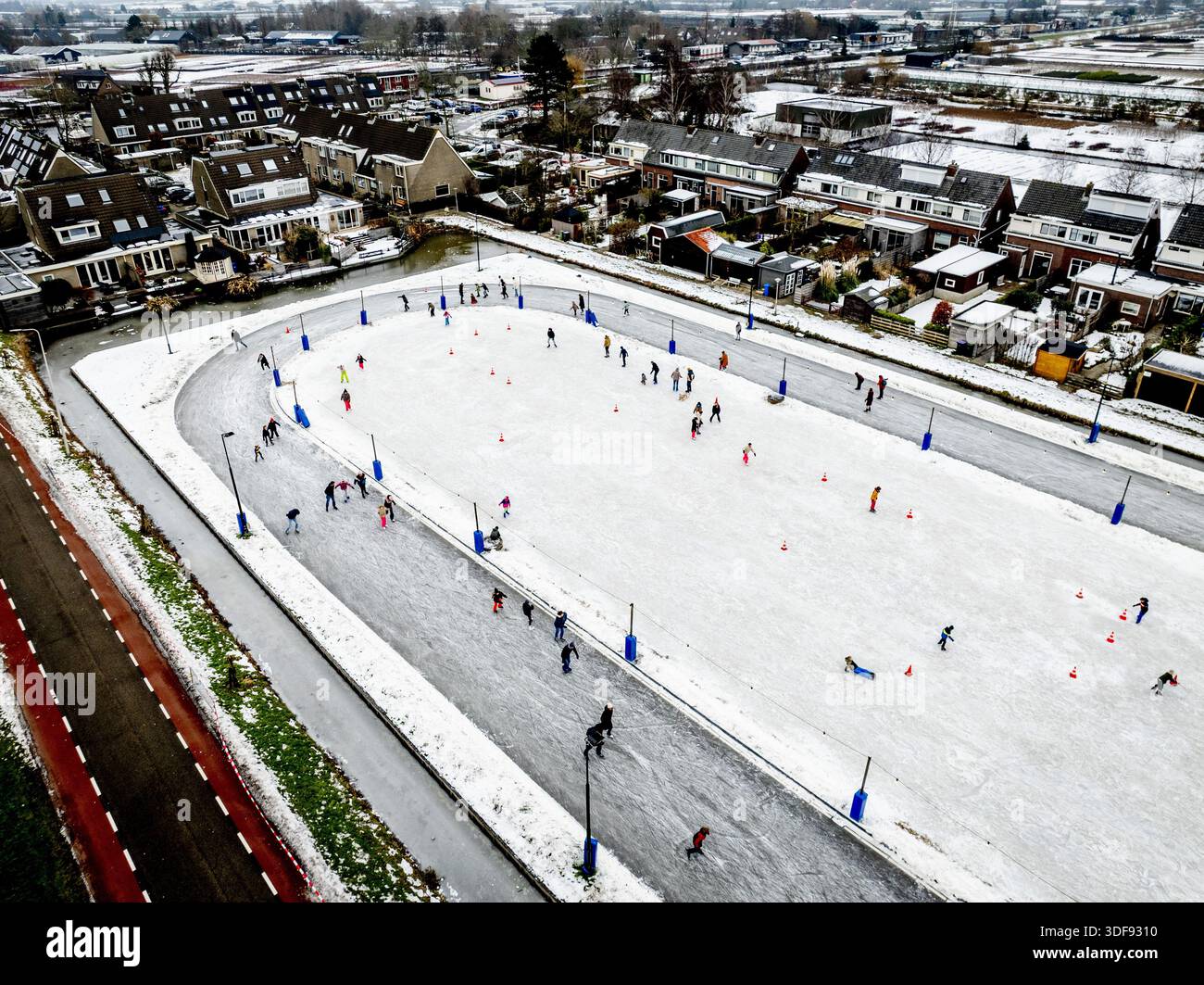 BOSKOOP - People are skating on the natural ice rink. Skating is ...