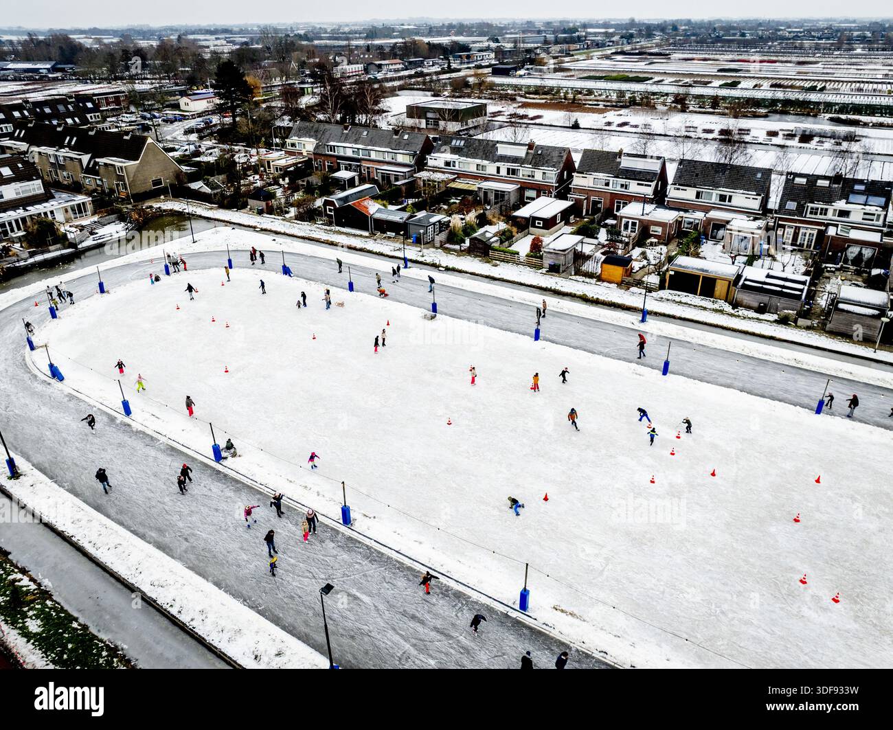 BOSKOOP - People are skating on the natural ice rink. Skating is ...