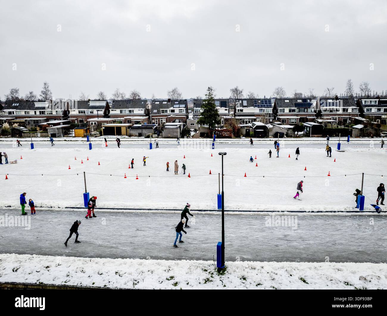 BOSKOOP - People are skating on the natural ice rink. Skating is ...