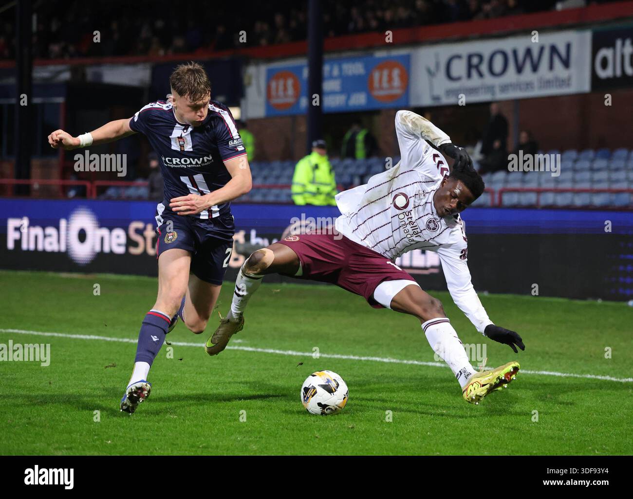 Dundee's Luke Graham (left) and Heart of Midlothian's Pierre Landry ...