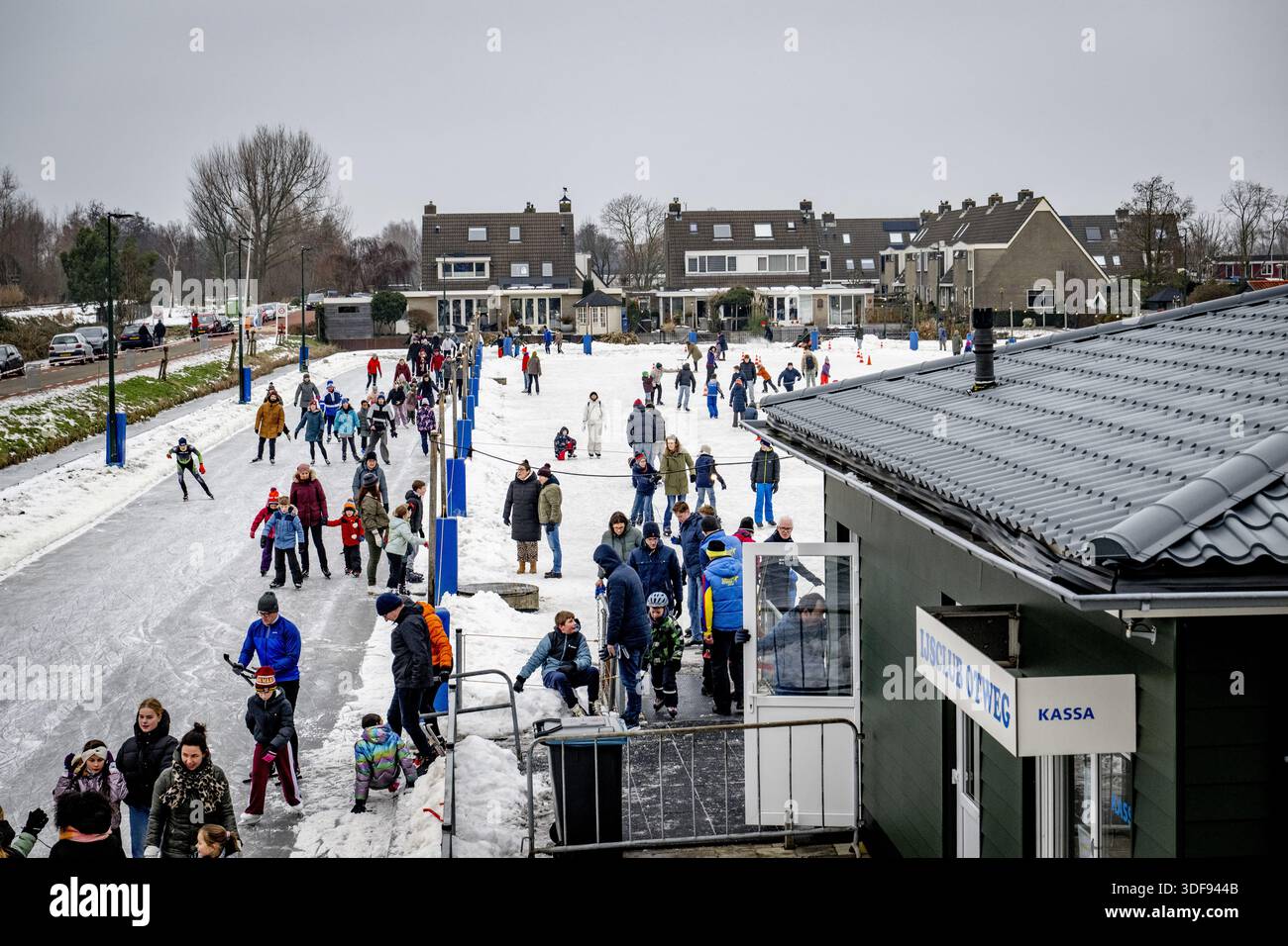 BOSKOOP - People are skating on the natural ice rink. Skating is ...